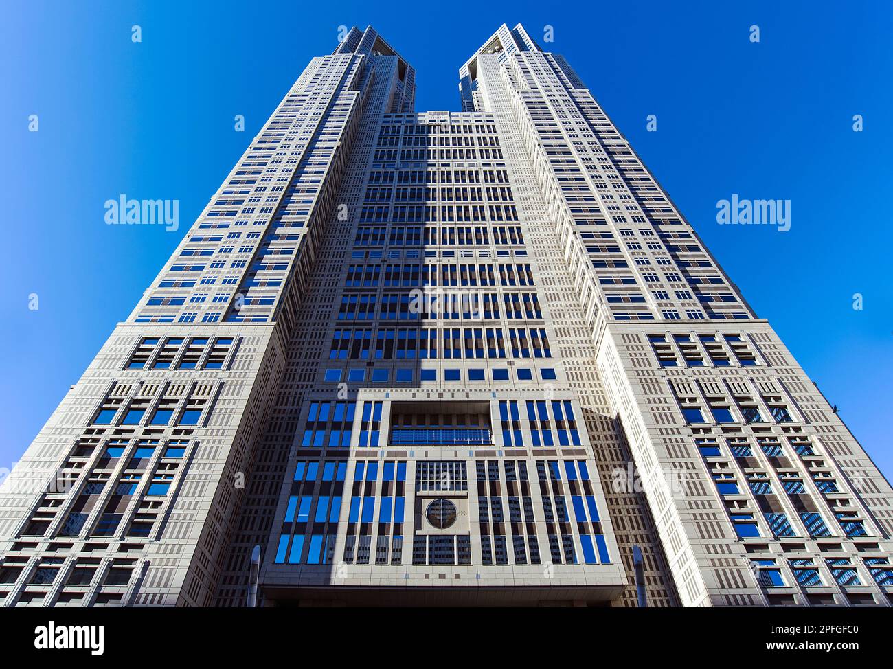 Tokyo Metropolitan Government Building with blue sky during warm sunny ...