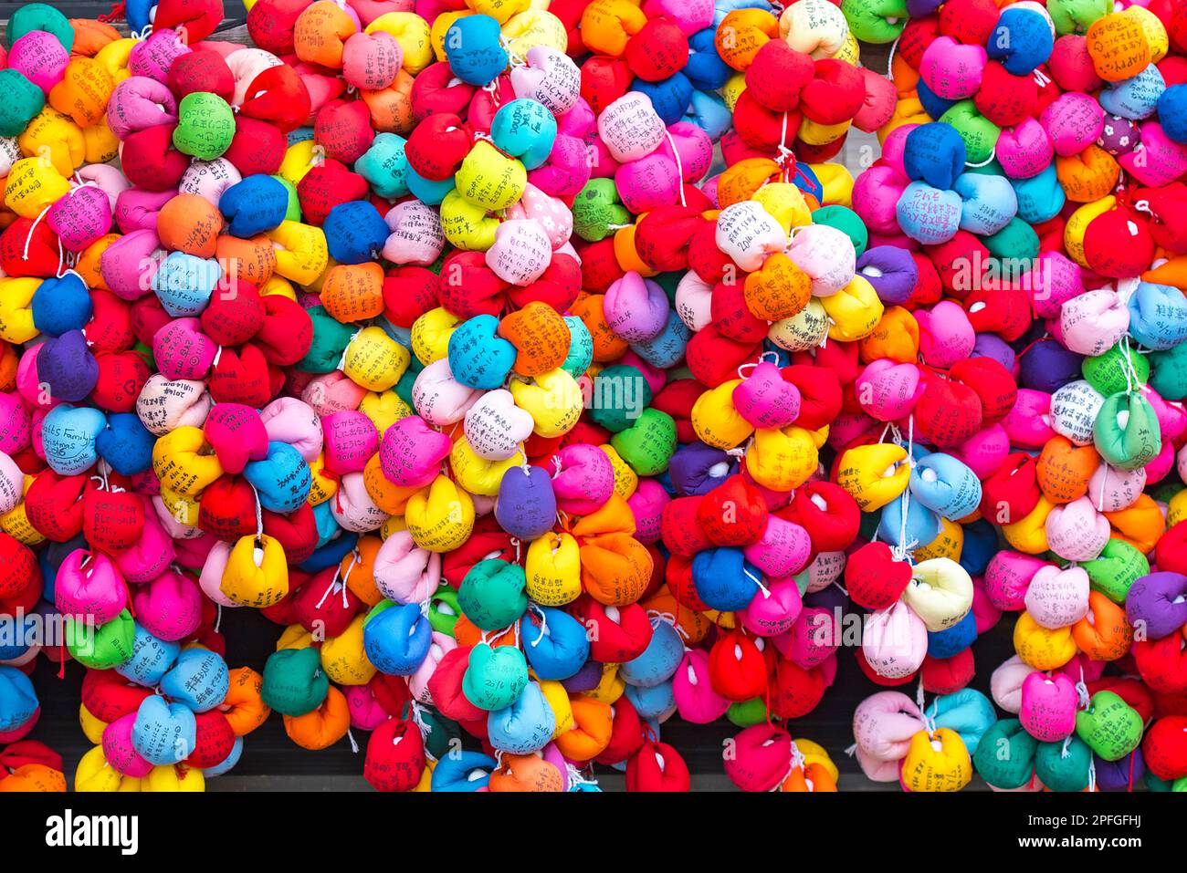 KYOTO - JAN 01: Multi-coloured kukurizaru balls at a temple in Kyoto on ...