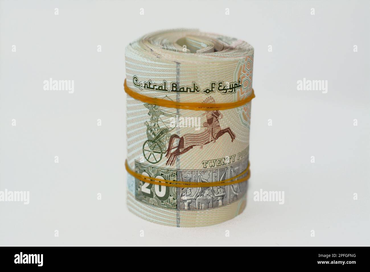 20 EGP LE twenty Egyptian pounds cash money bills rolled up with rubber ...