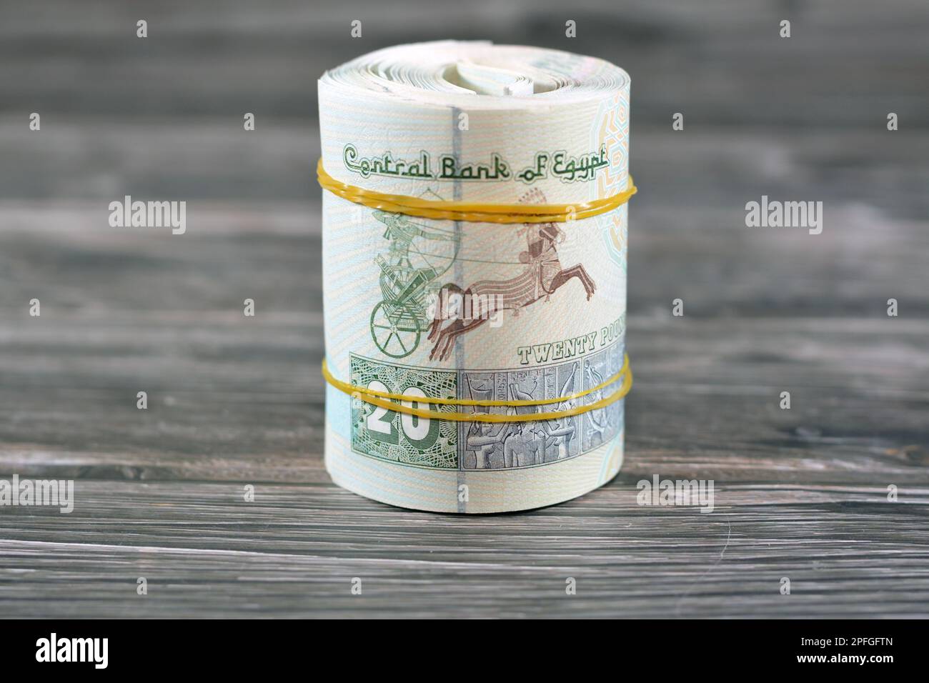 Rolled up 20 pound note hi-res stock photography and images - Alamy