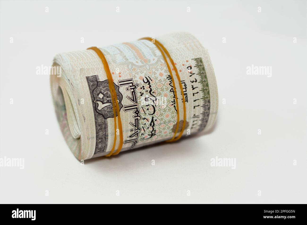 20 EGP LE twenty Egyptian pounds cash money bills rolled up with rubber ...
