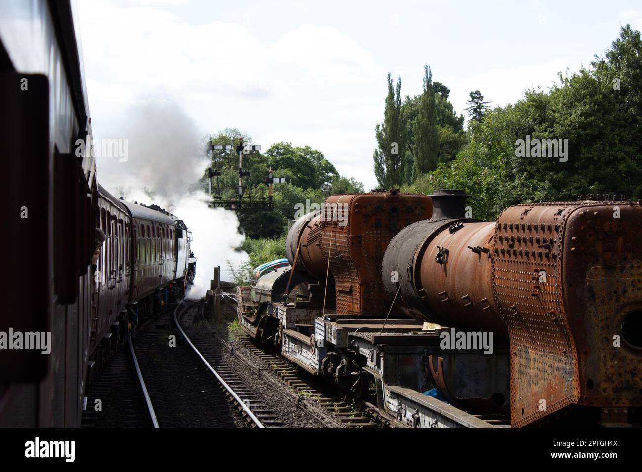 Train passing cemetery hi-res stock photography and images - Alamy