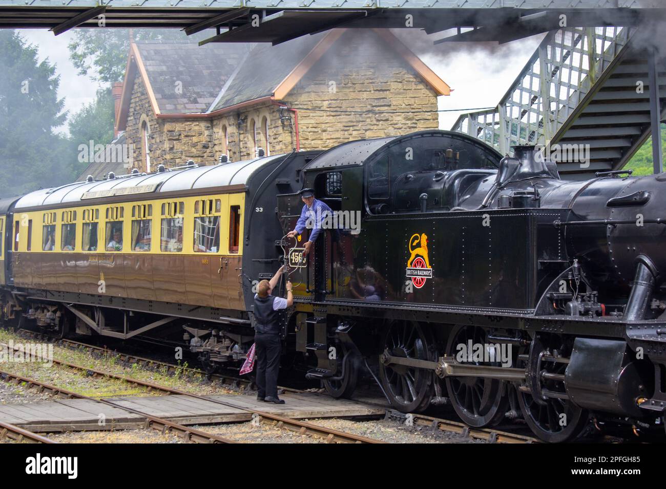 Steam railway. Driver and signal staff exchanging tokens Stock Photo ...