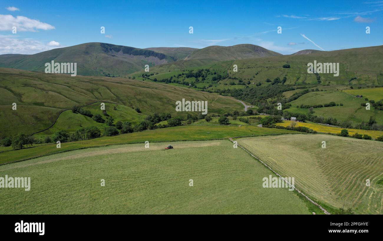 Mowing a traditional hay meadow on the edge of the Yorkshire Dales ...