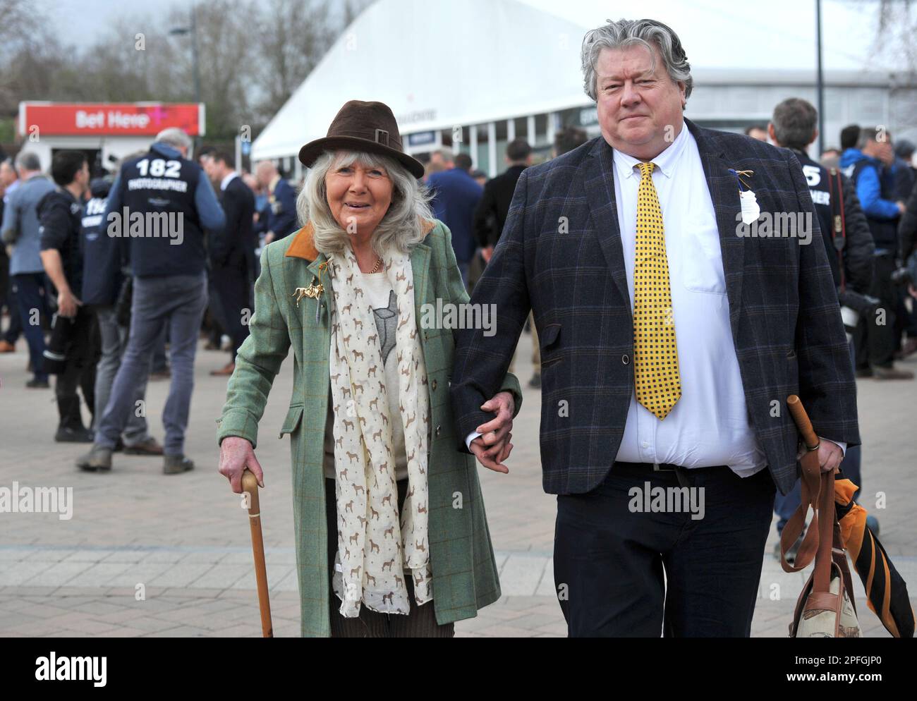 Crowds enter the racecourse including author Jilly Cooper with son ...