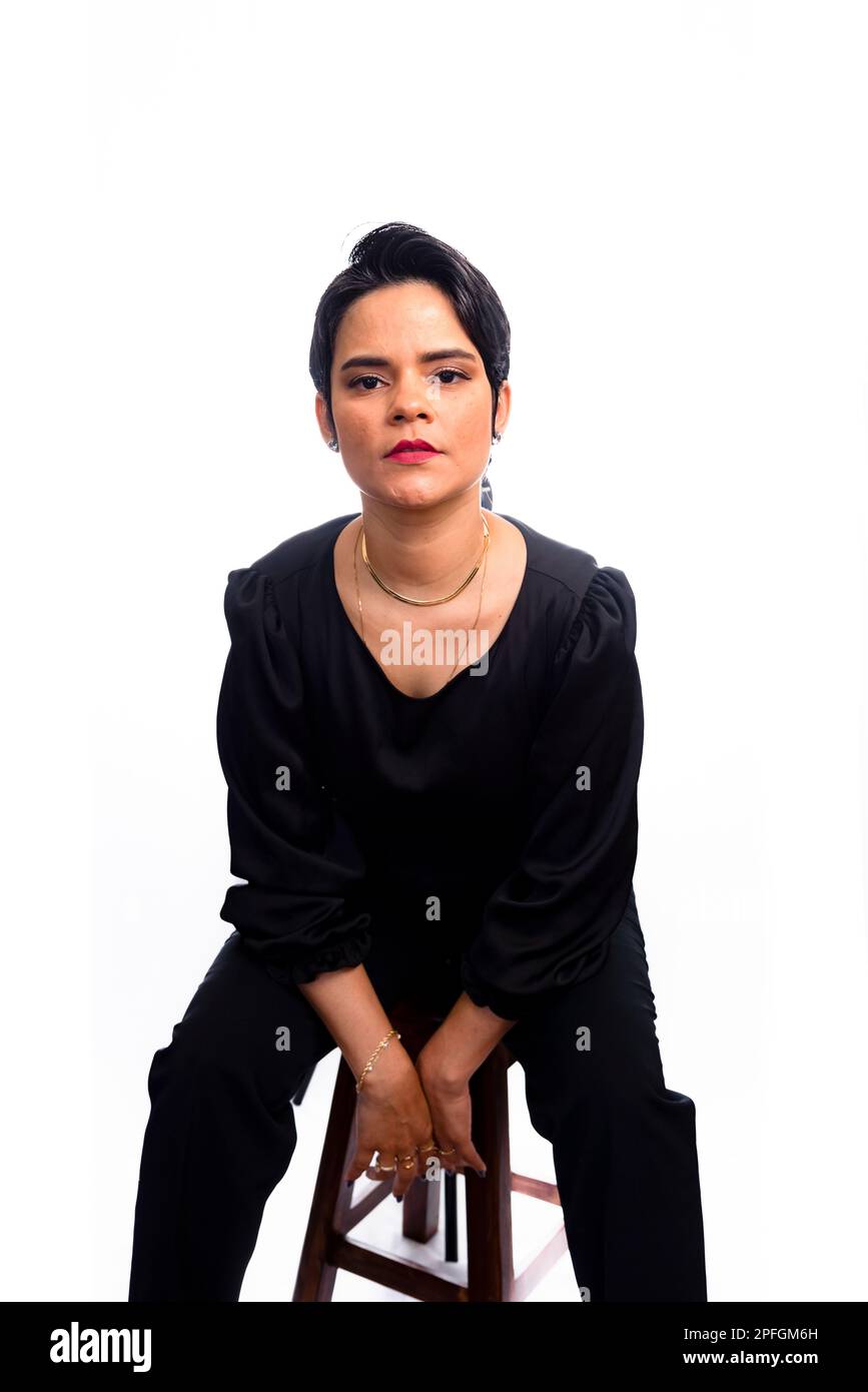 Confident young female investor wearing black. Isolated on white ...