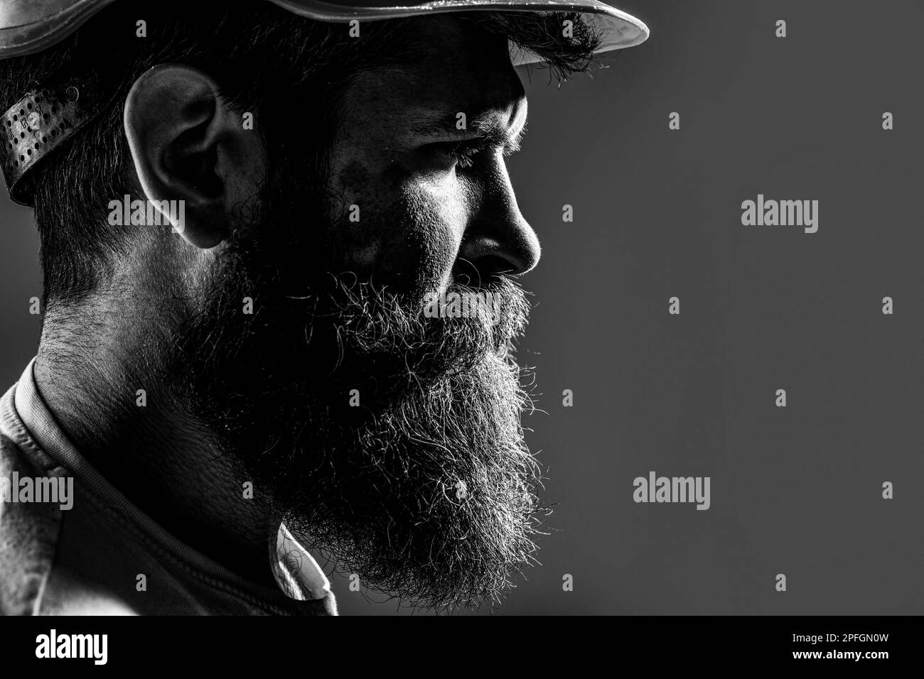 Man builders, industry. Bearded man worker with beard in building ...