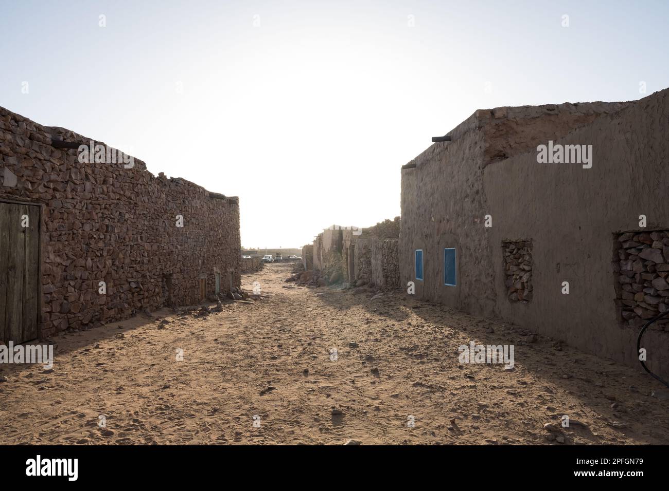 The crumbling stone walls and ruins of the ancient desert city of ...