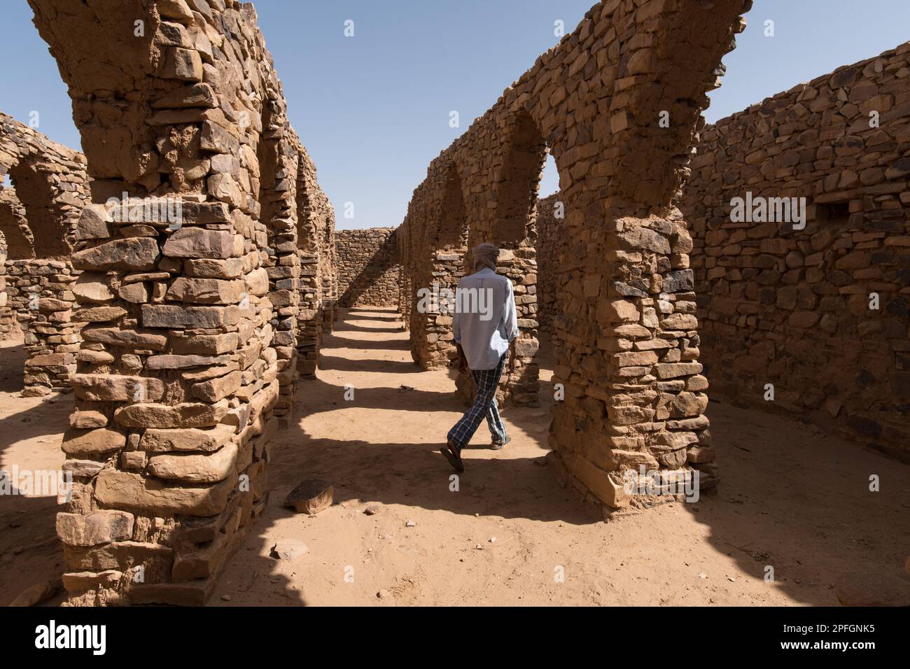 The labyrinthine stone arches and passages of the ancient ruins in ...