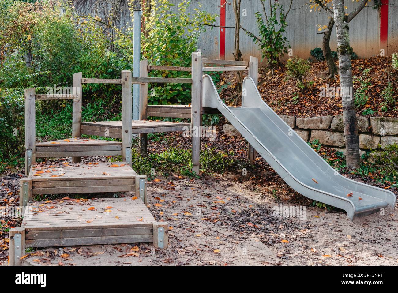 Children's playground with slide on autumn day. Children's playground ...