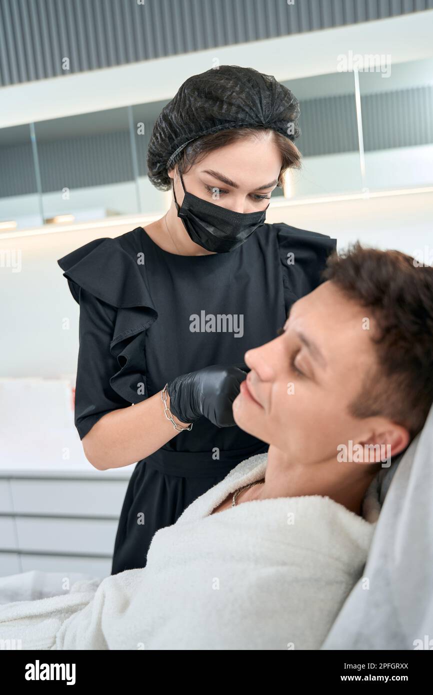 Young man getting injection in hi-res stock photography and images - Alamy