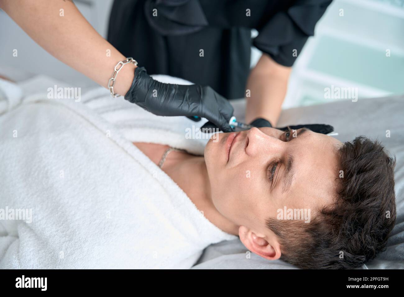 Male client injections in hi-res stock photography and images - Alamy