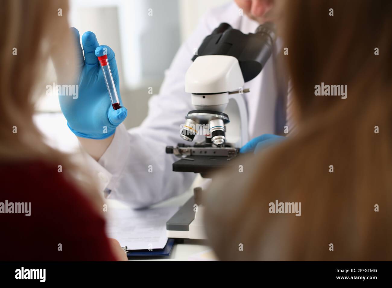 Examine blood in microscope hi-res stock photography and images - Alamy