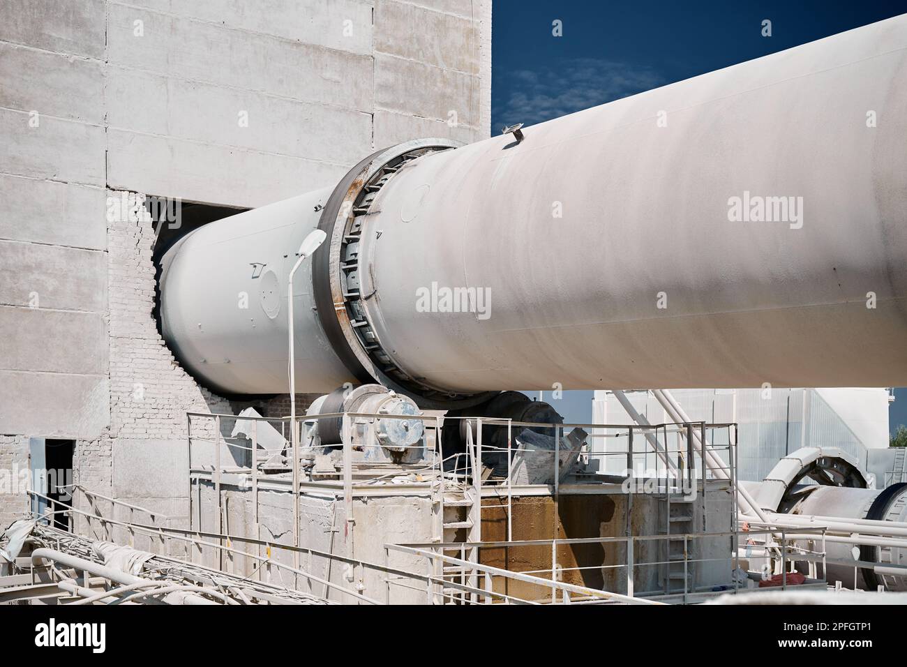Building of loading device of roasting rotary furnace Stock Photo - Alamy