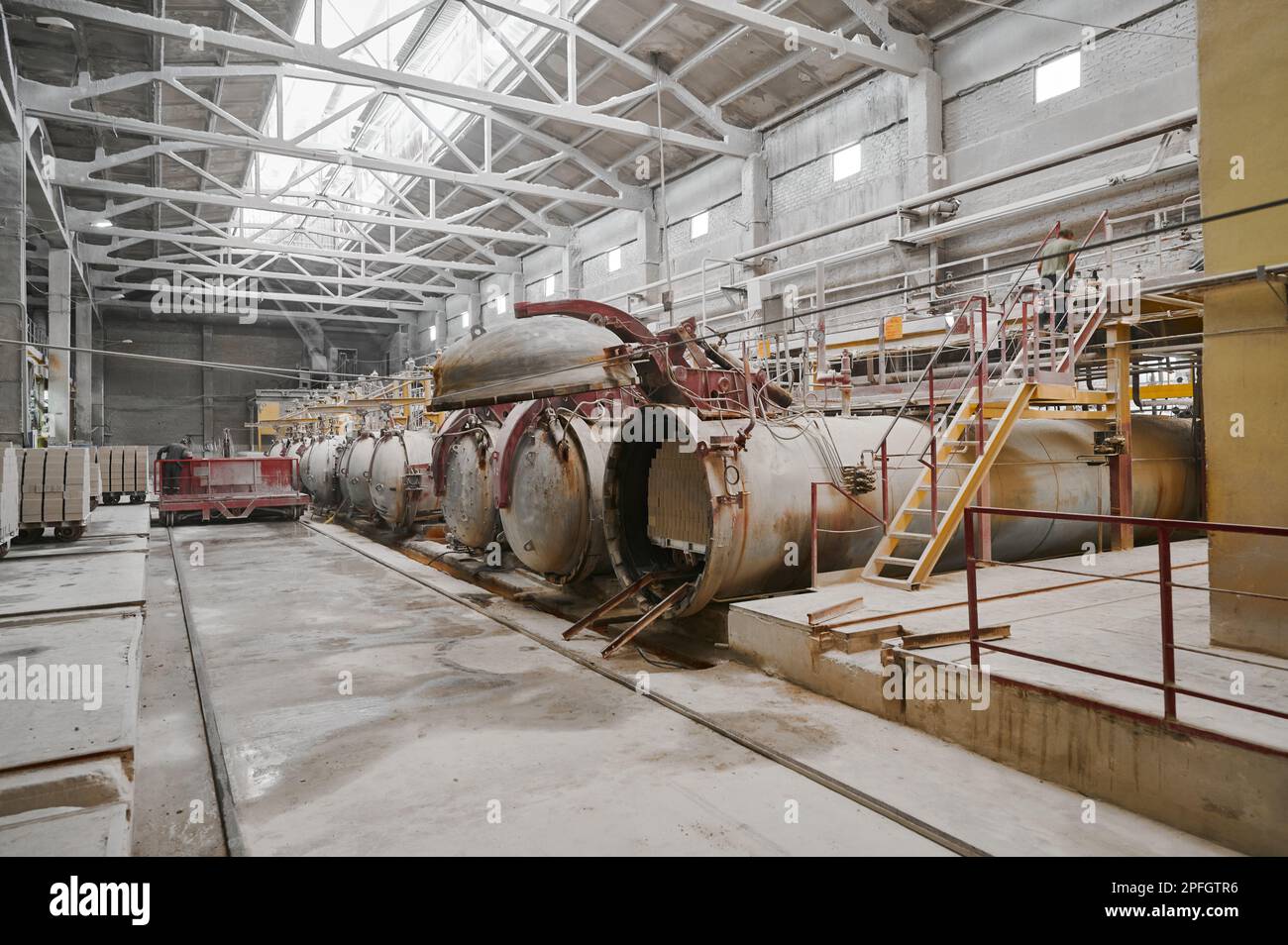 Autoclaves for hardening concrete bricks in plant workshop Stock Photo ...