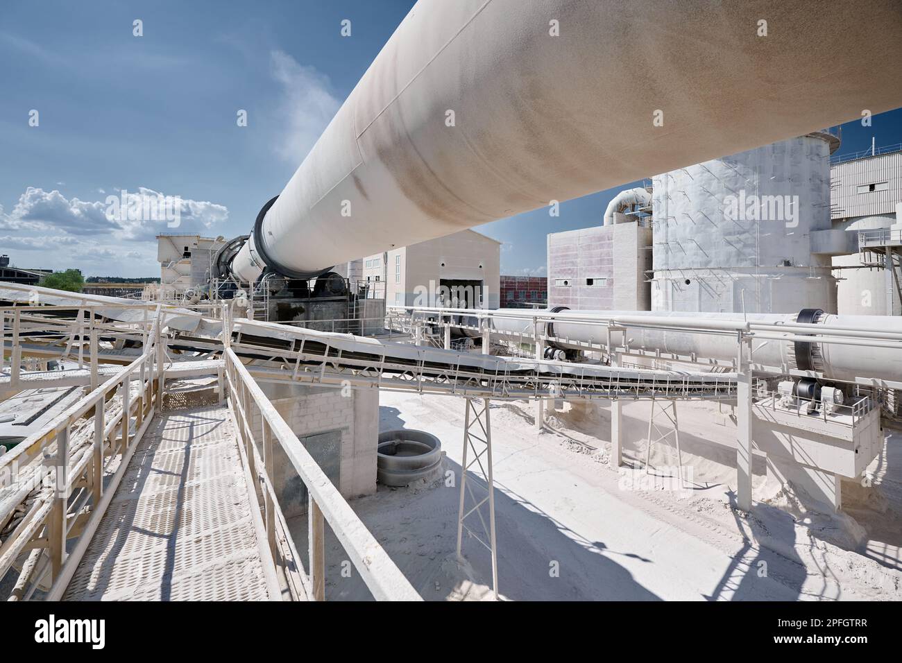 Limestone burning rotary furnace as pipe at industrial plant Stock ...