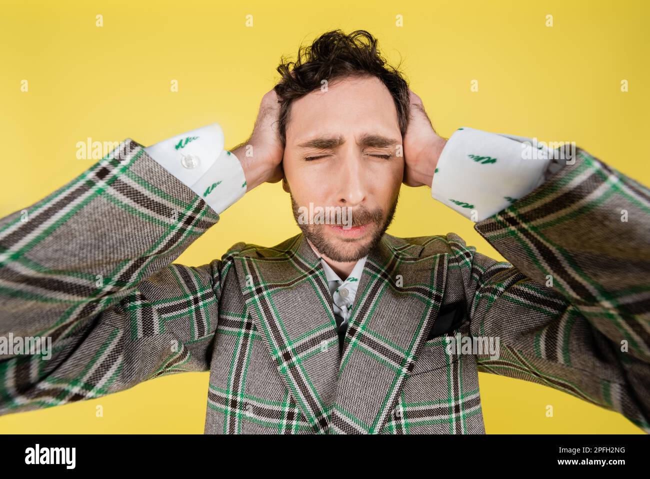 Covering ears stock hi-res stock photography and images - Alamy