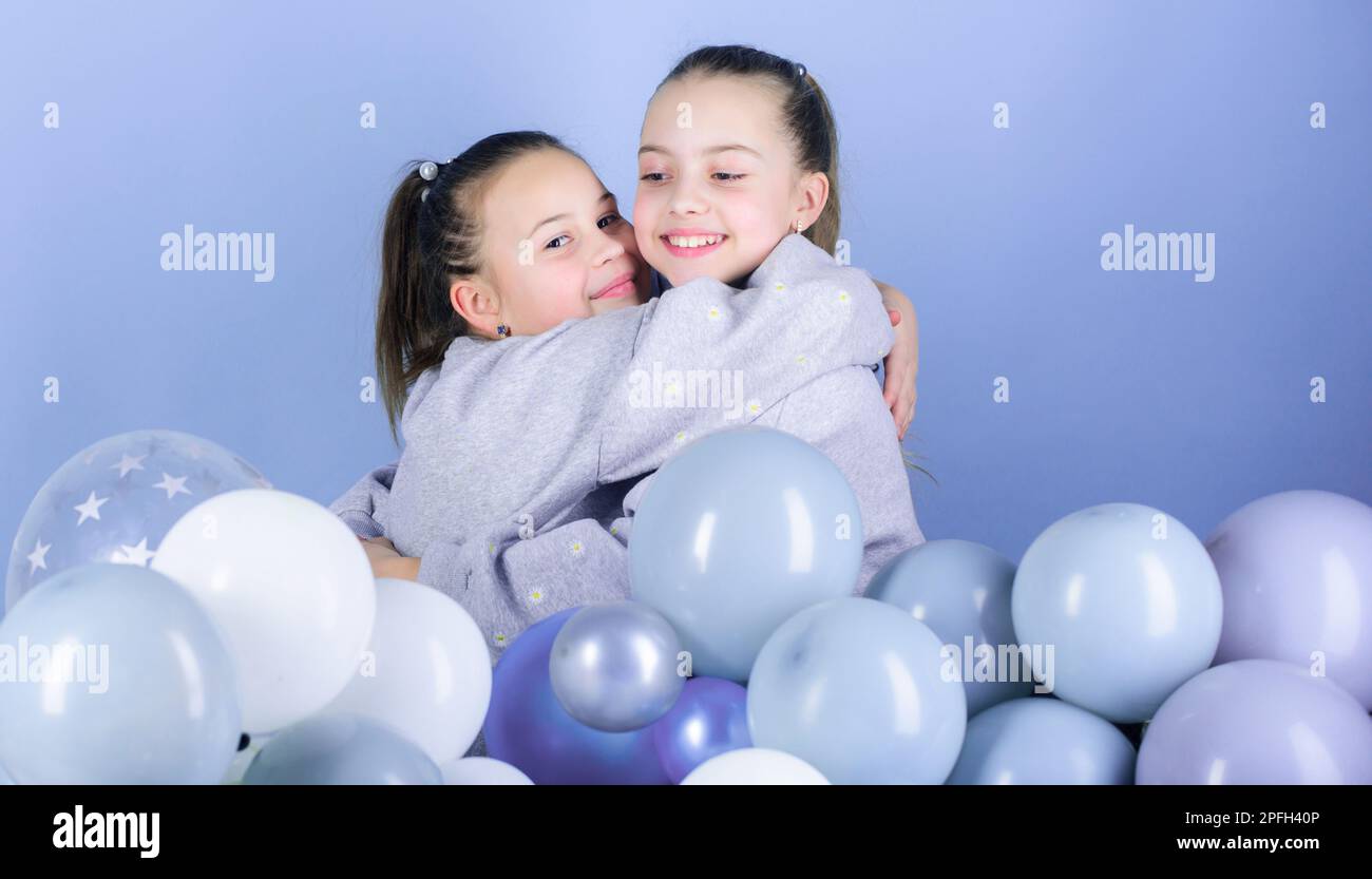 Balloon theme party. Girls best friends near air balloons. Birthday ...