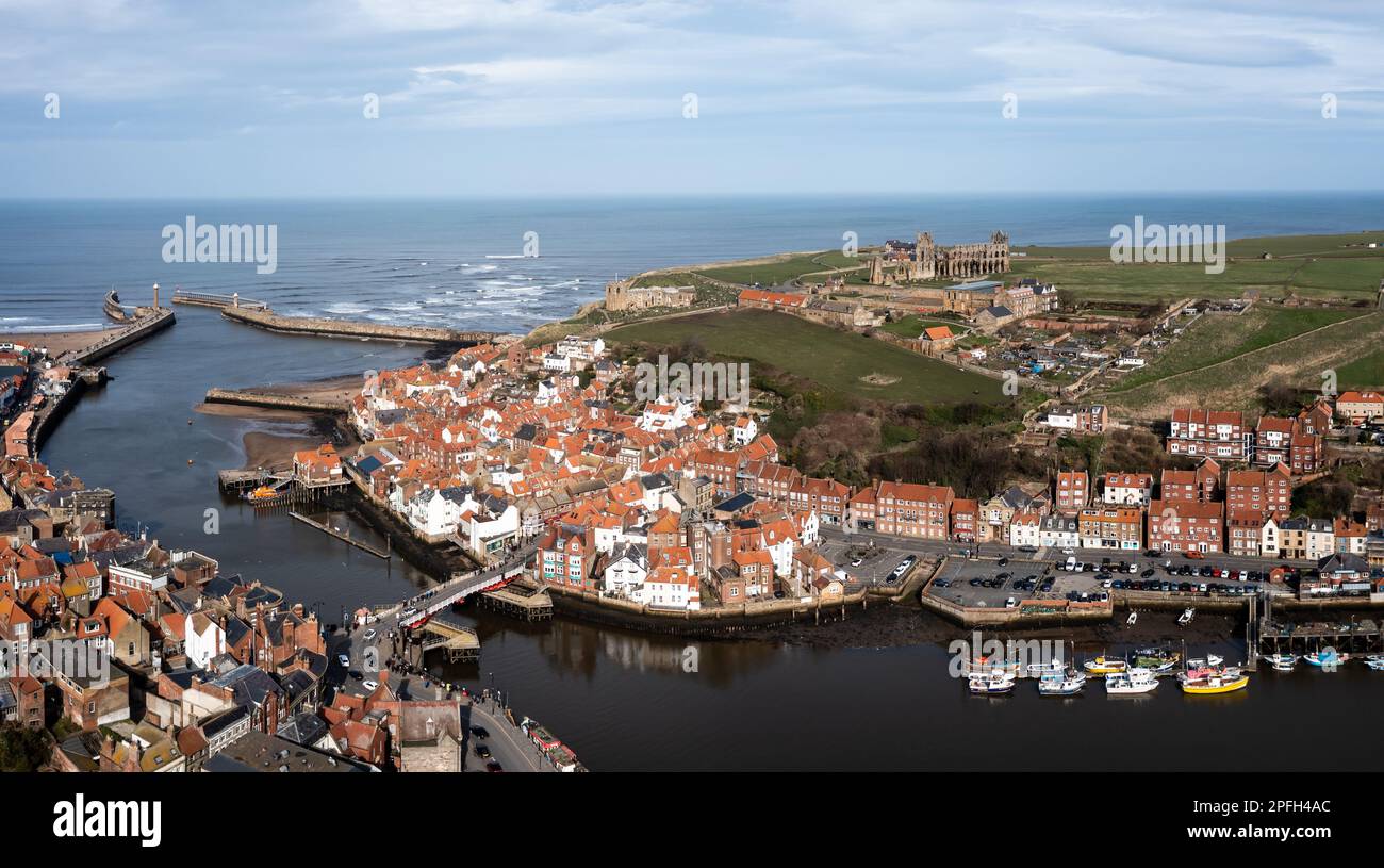 WHITBY, UK - MARCH 12, 2023. An aerial landscape of the harbour and ...