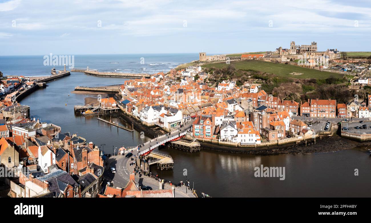 WHITBY, UK - MARCH 12, 2023. An aerial landscape of the harbour and ...