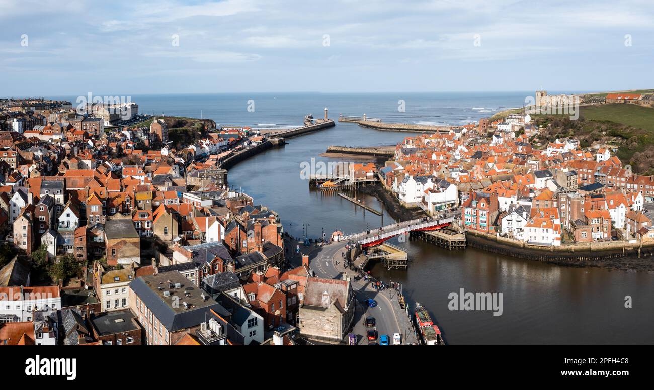 WHITBY, UK - MARCH 12, 2023. An aerial landscape of the harbour and ...