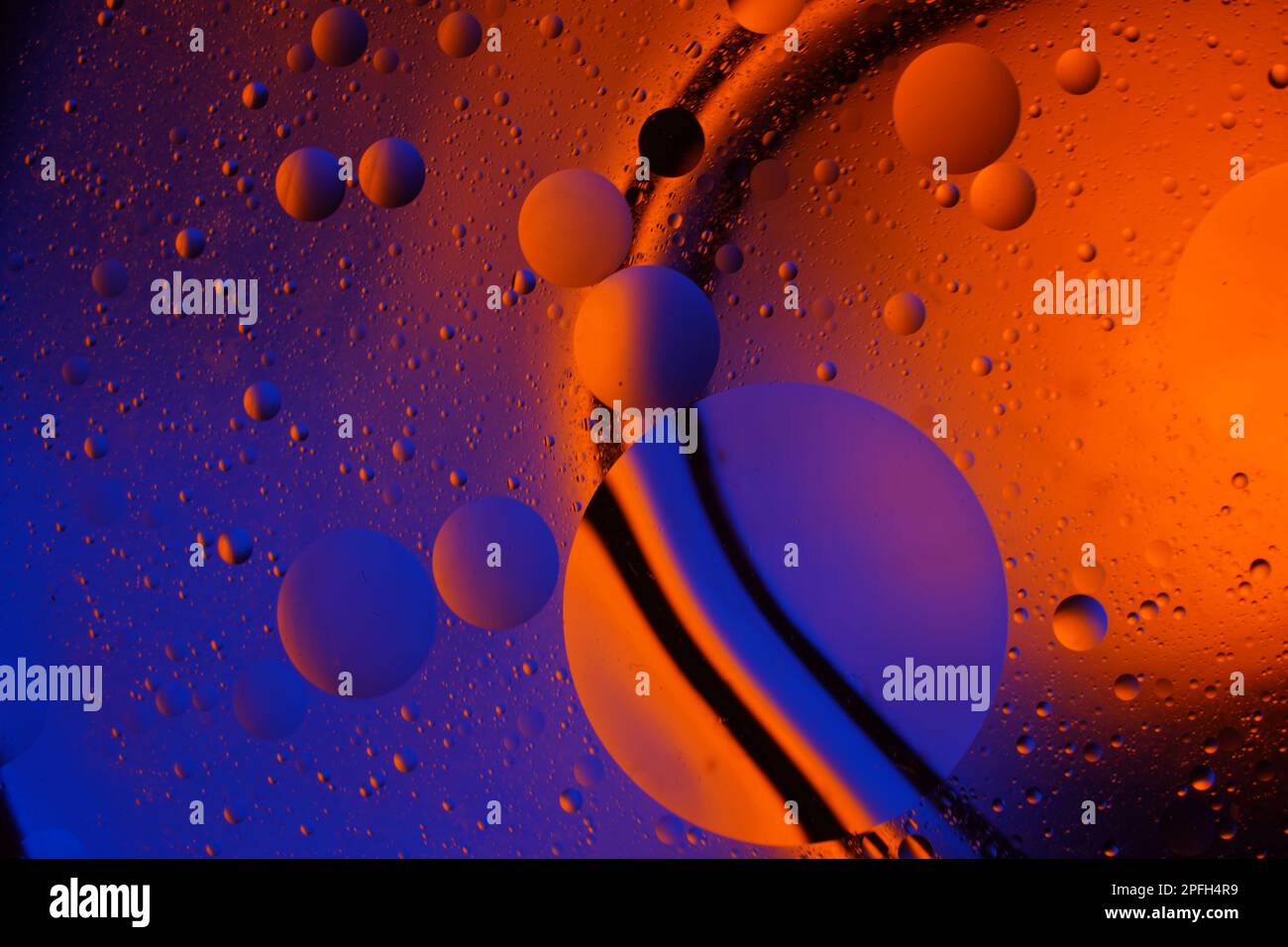 Oil in water, amazing effect, varies colour Stock Photo - Alamy