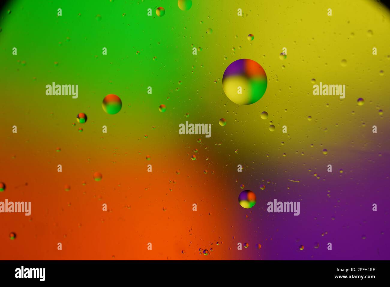 Oil in water, amazing effect, varies colour Stock Photo - Alamy