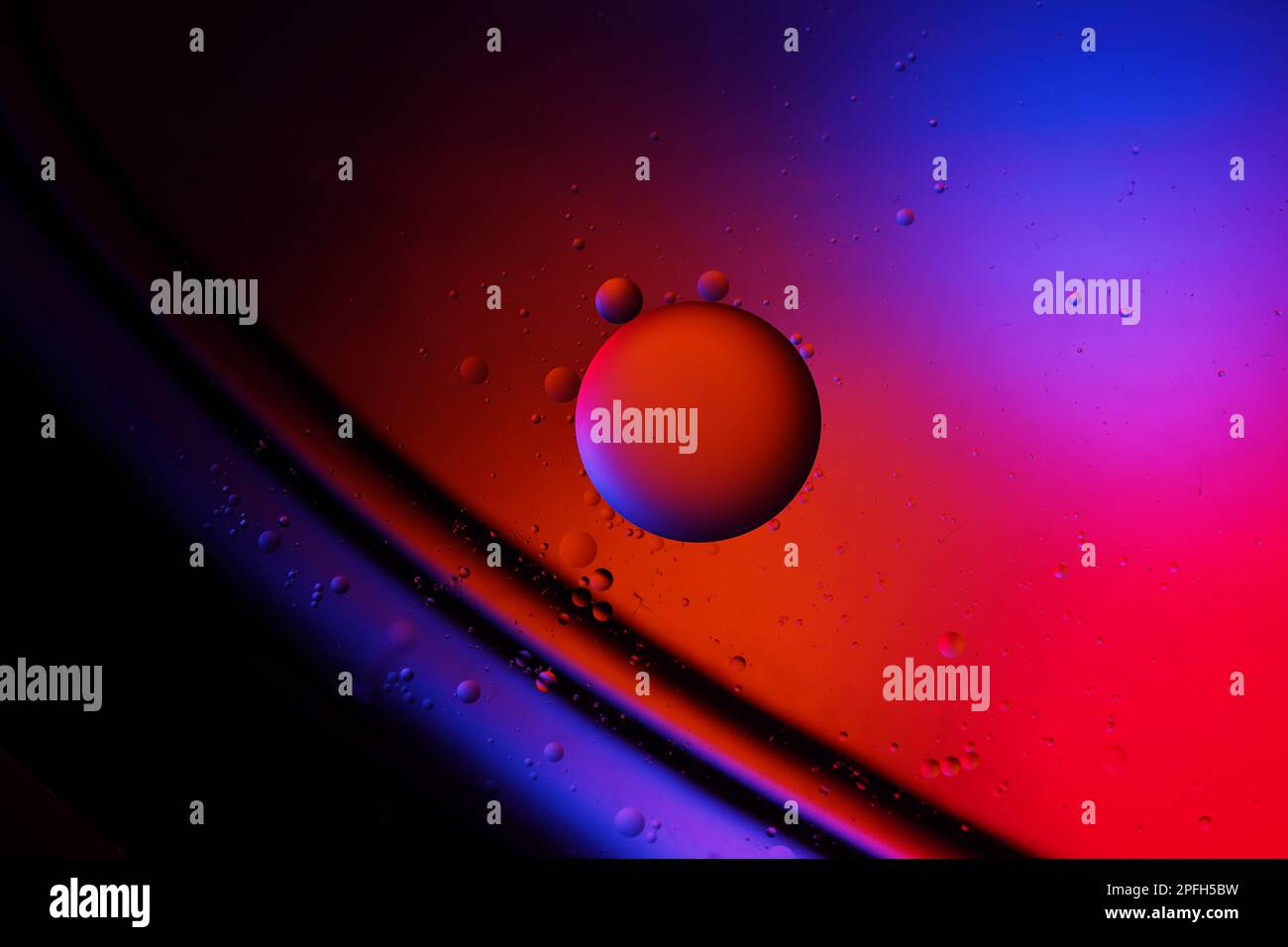 Oil in water, amazing effect, varies colour Stock Photo - Alamy