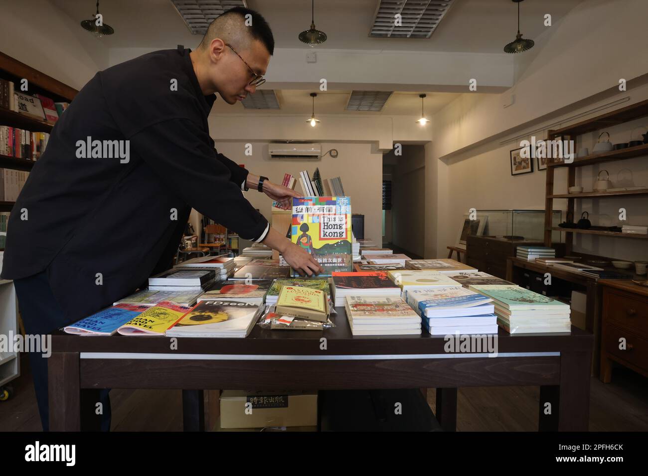 Word by Word bookshop owner Michael Lui Ka-Chun poses for a photo at ...