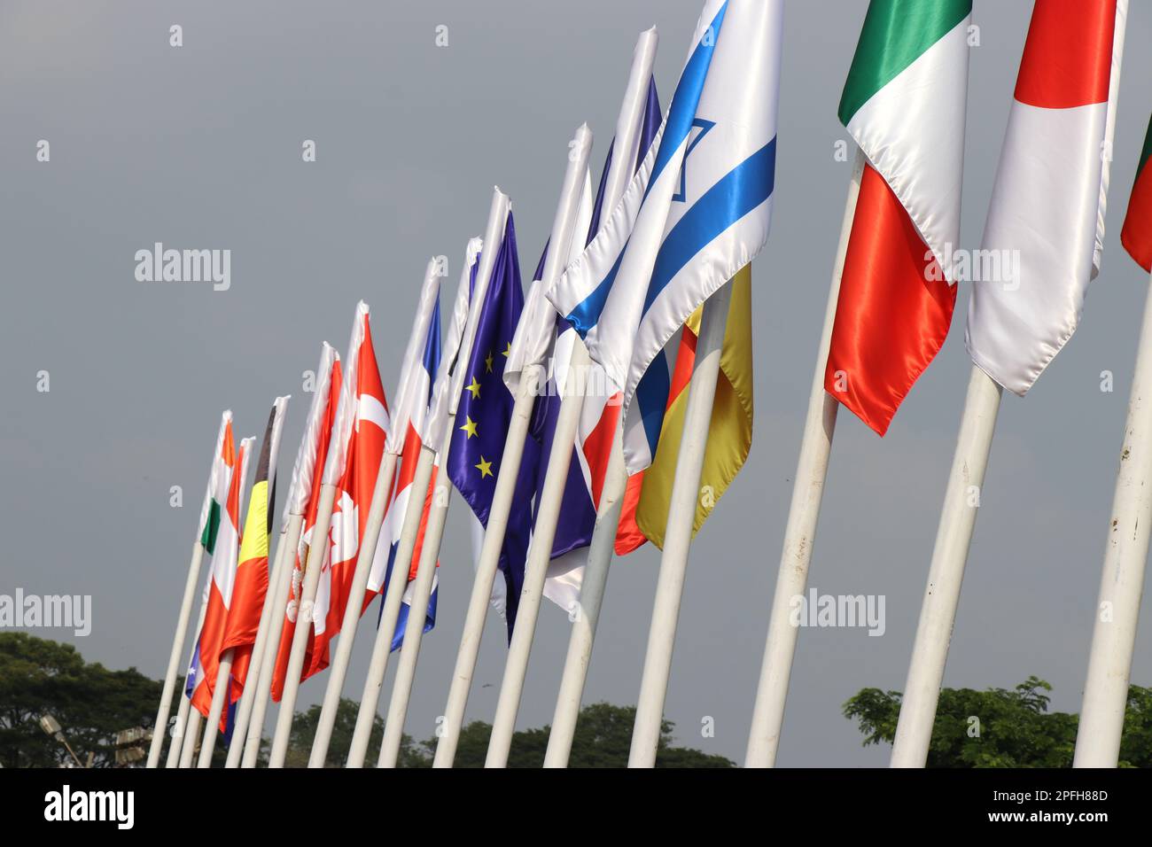 A view of the flying flags of all nations in the wind Stock Photo - Alamy