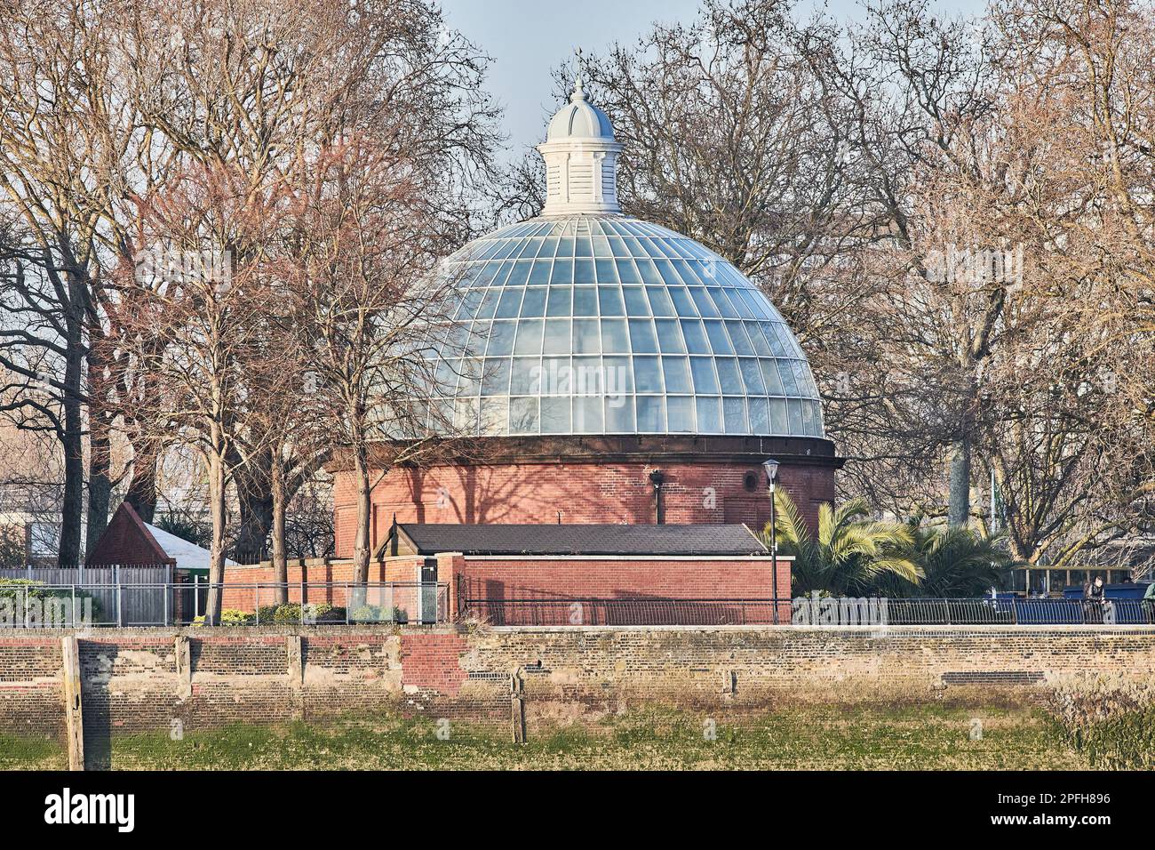 On the north bank of the river Thames, a dome over the entrance and ...