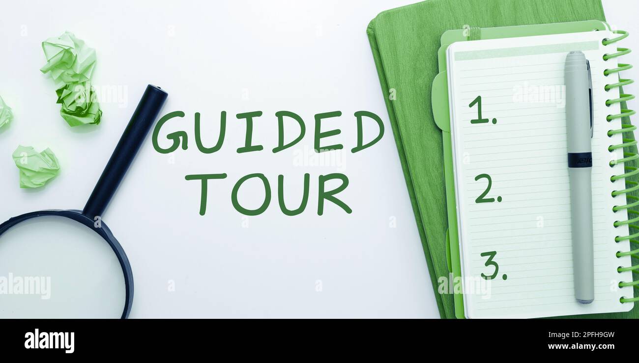 Hand writing sign Guided Tour. Business concept advice or information ...