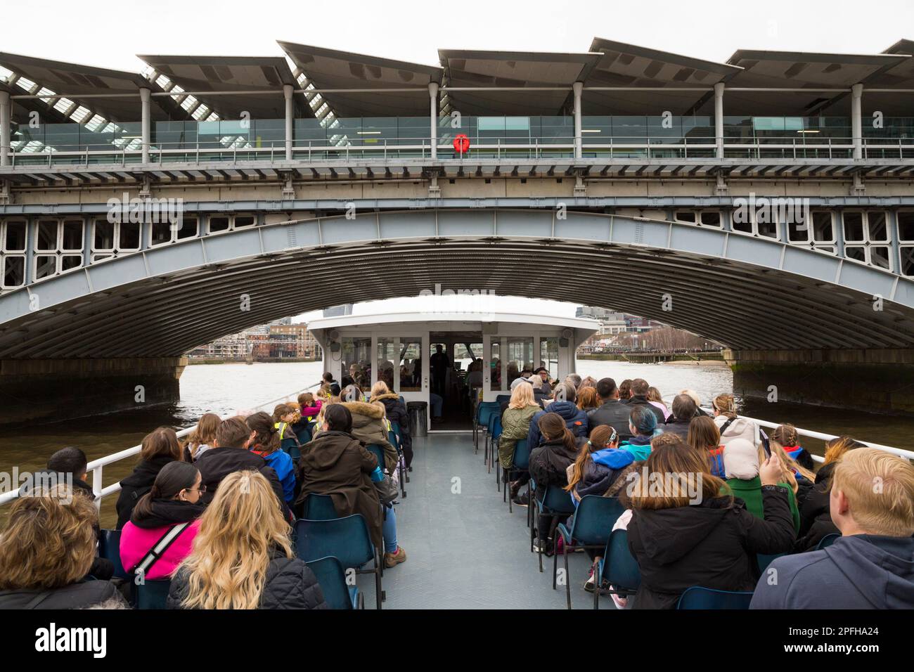 Blackfriars Rail Bridge (seen from a boat passing underneath) which ...
