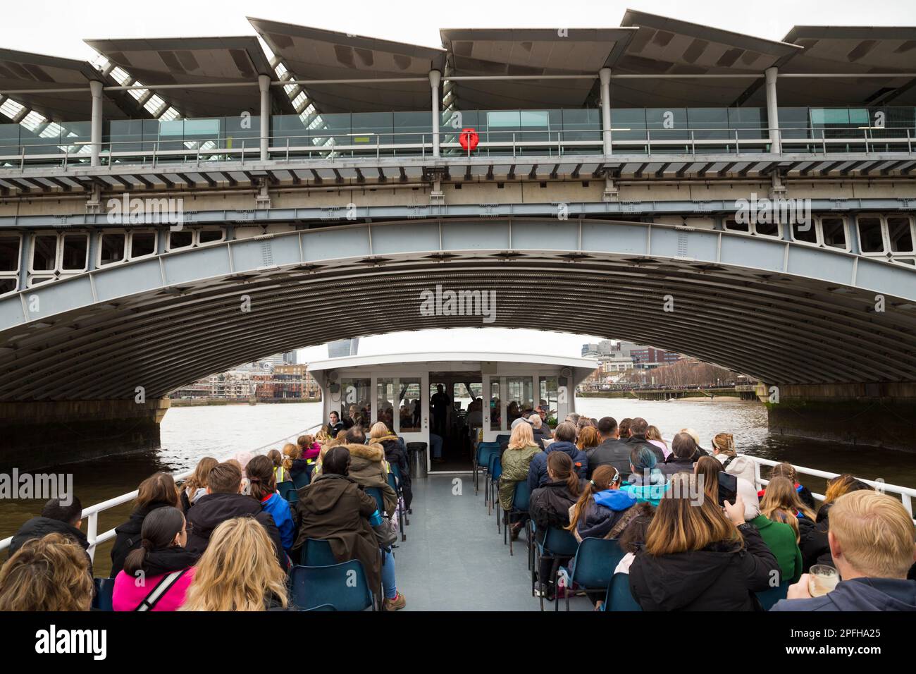 Blackfriars Rail Bridge (seen from a boat passing underneath) which ...