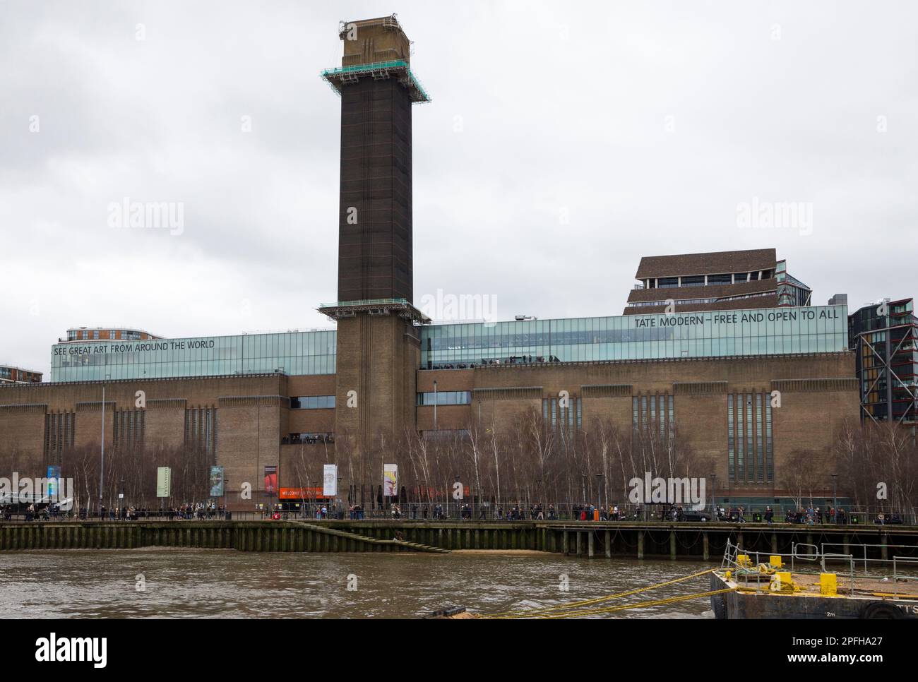 Seen from a river boat and with building works scaffolding around its ...