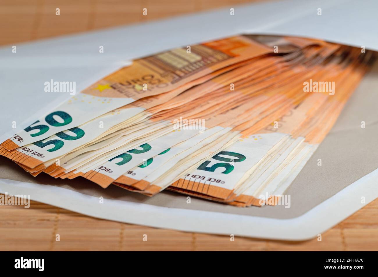 Banknotes in an envelope, close-up Stock Photo - Alamy