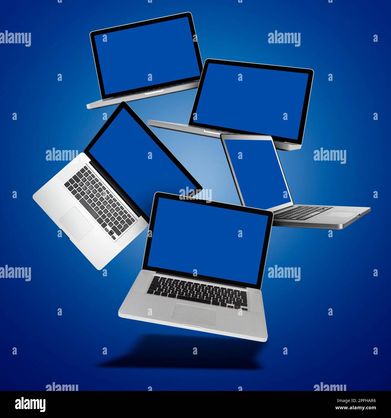 Floating Collection of laptop on blue gradient background Stock Photo ...
