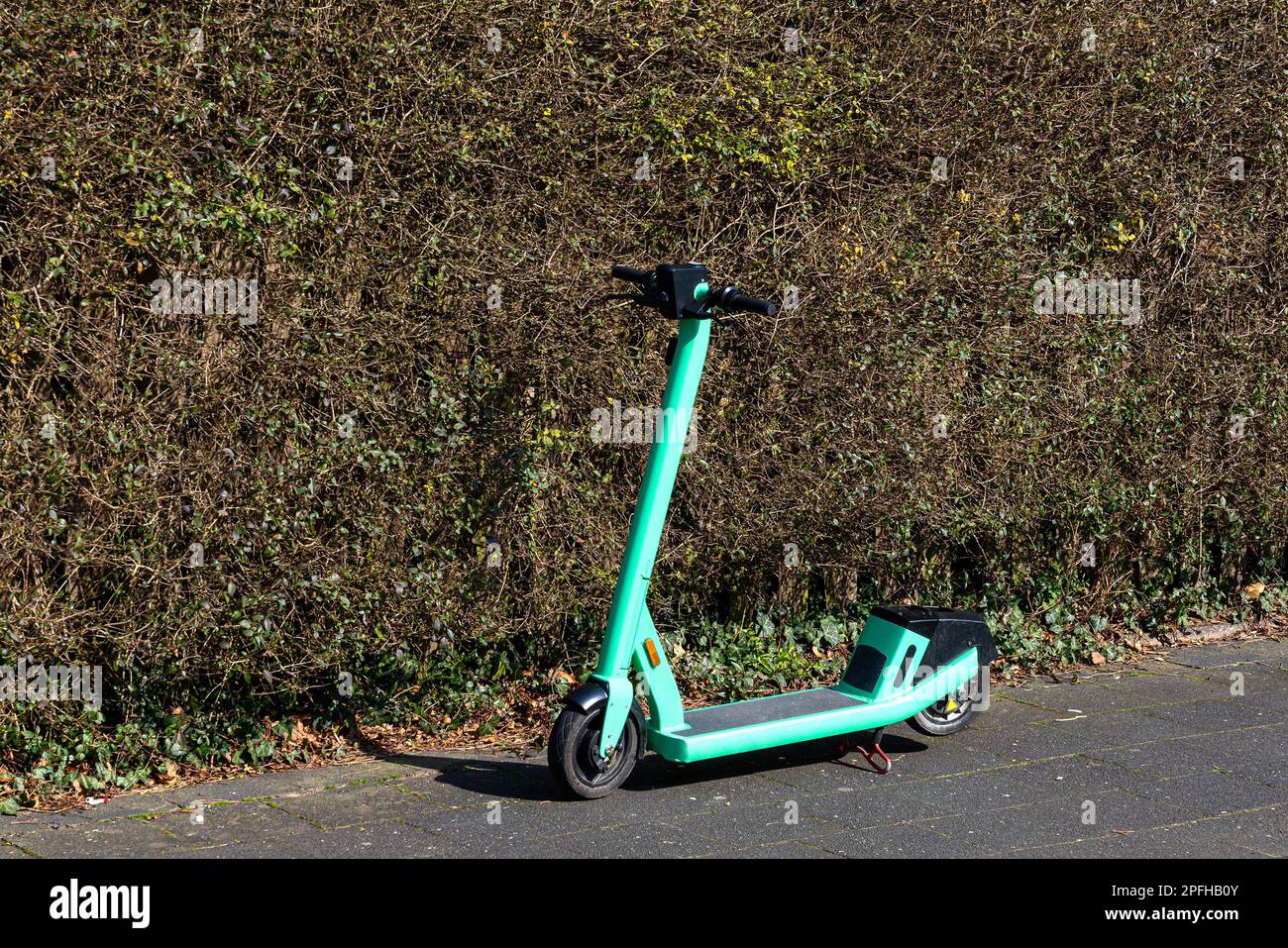 Turquoise electric scooter hi-res stock photography and images - Alamy