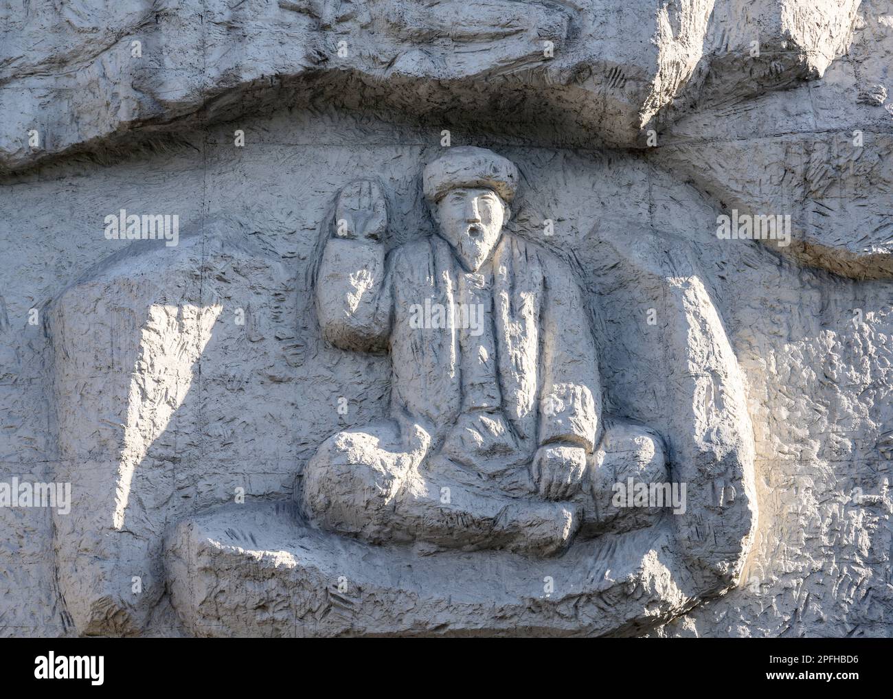 Bas-relief with national historical figure of an elder in Bishkek, the ...