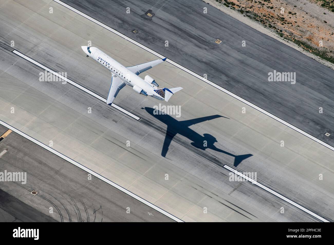 Commercial airliner landing taking off taxiing at LAX Los Angeles ...
