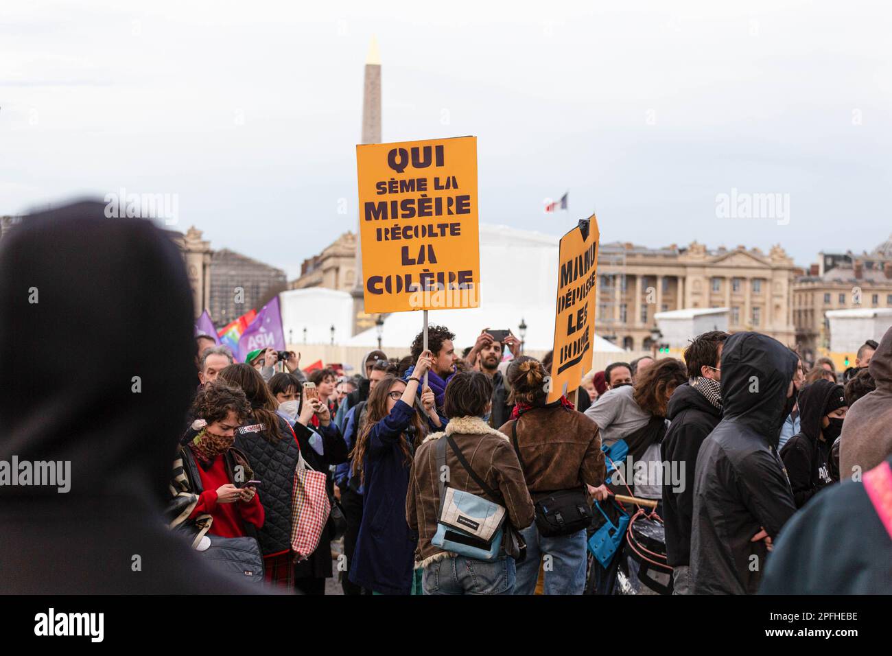 Paris, France. 16th Mar, 2023. Protesters hold placards expressing ...