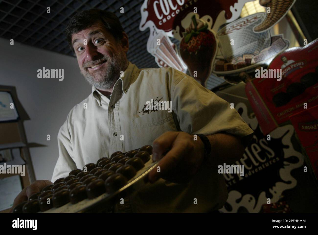 cocoapete024 ls.jpg Pete Slosberg and a tray of Nuts So Seriously ...