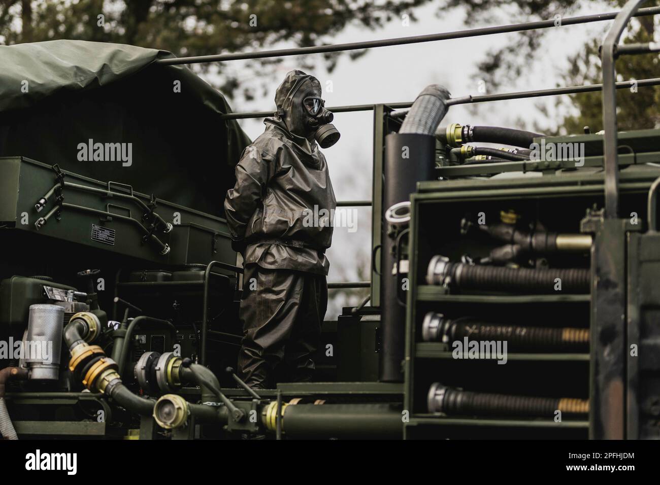 Grinding Angle, Deutschland. 16th Mar, 2023. NBC defense soldier with ...