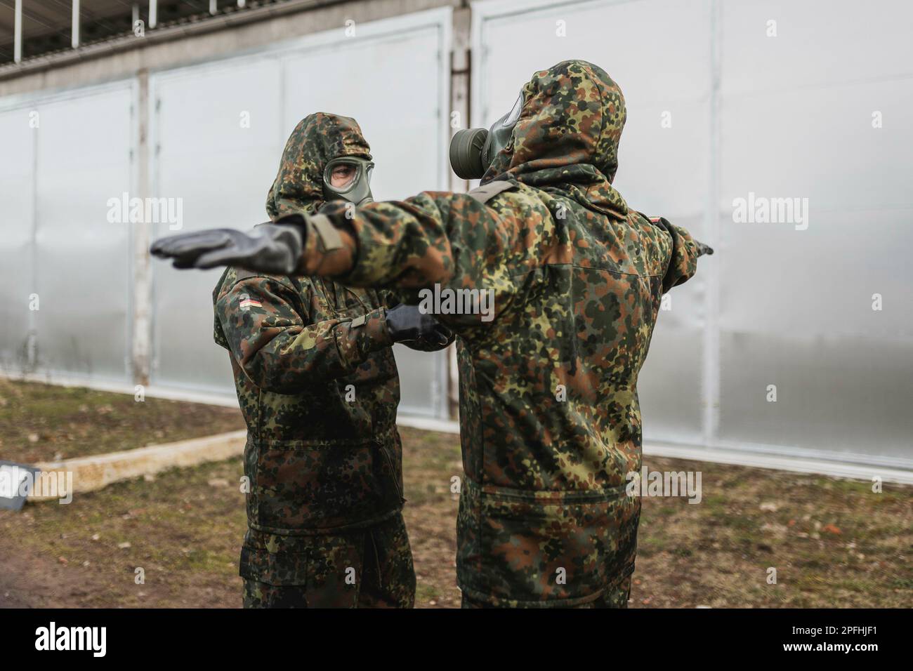 Two NBC defense soldiers in protective gear, pictured during ...