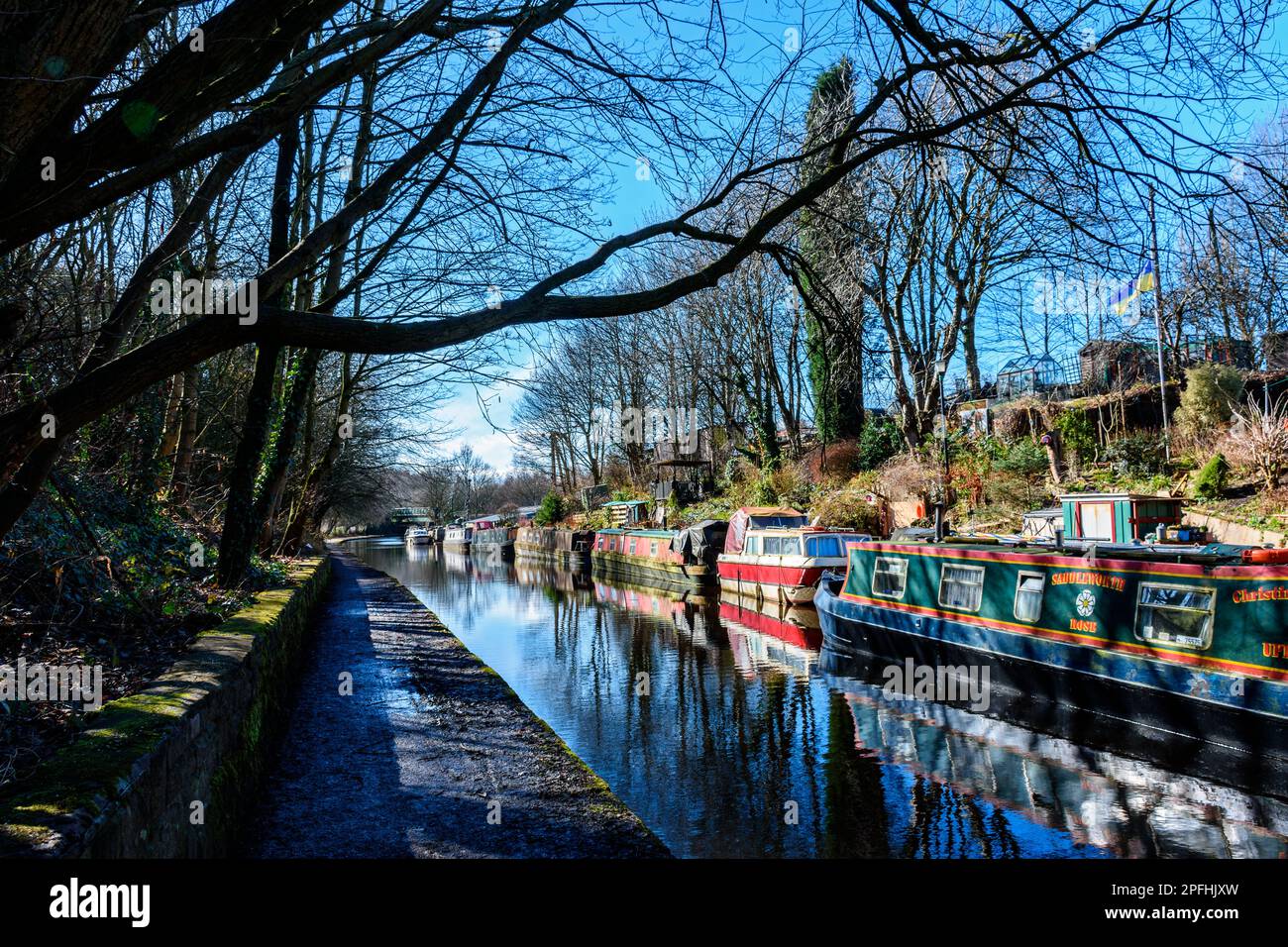 Narrowboats moored on the Ashton Canal. Guide Bridge, Ashton-under-Lyne ...