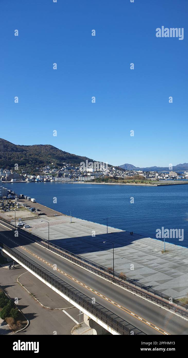 Aerial view of road winding alongside seashore in Hokkaido Japan Stock ...
