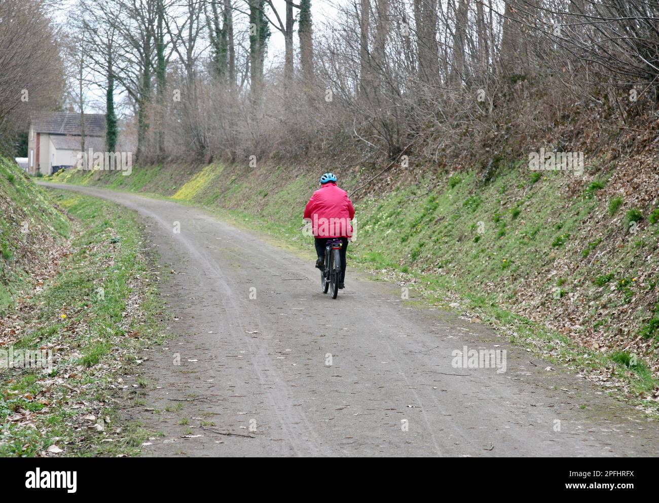 A lady on a bicycle in the French countryside Stock Photo - Alamy