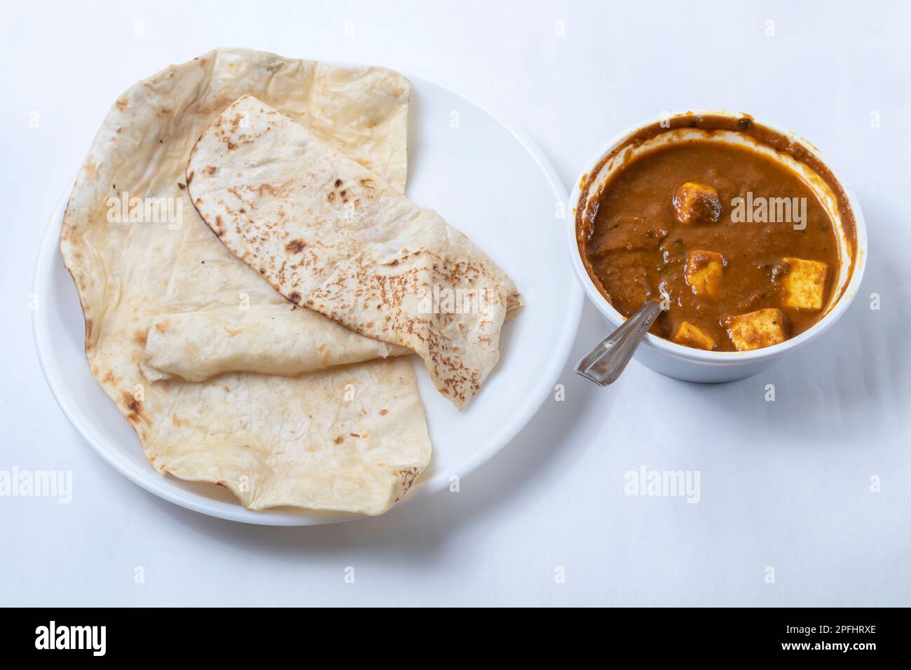 Indian food, chapati with curry, butter naan roti with paneer butter ...