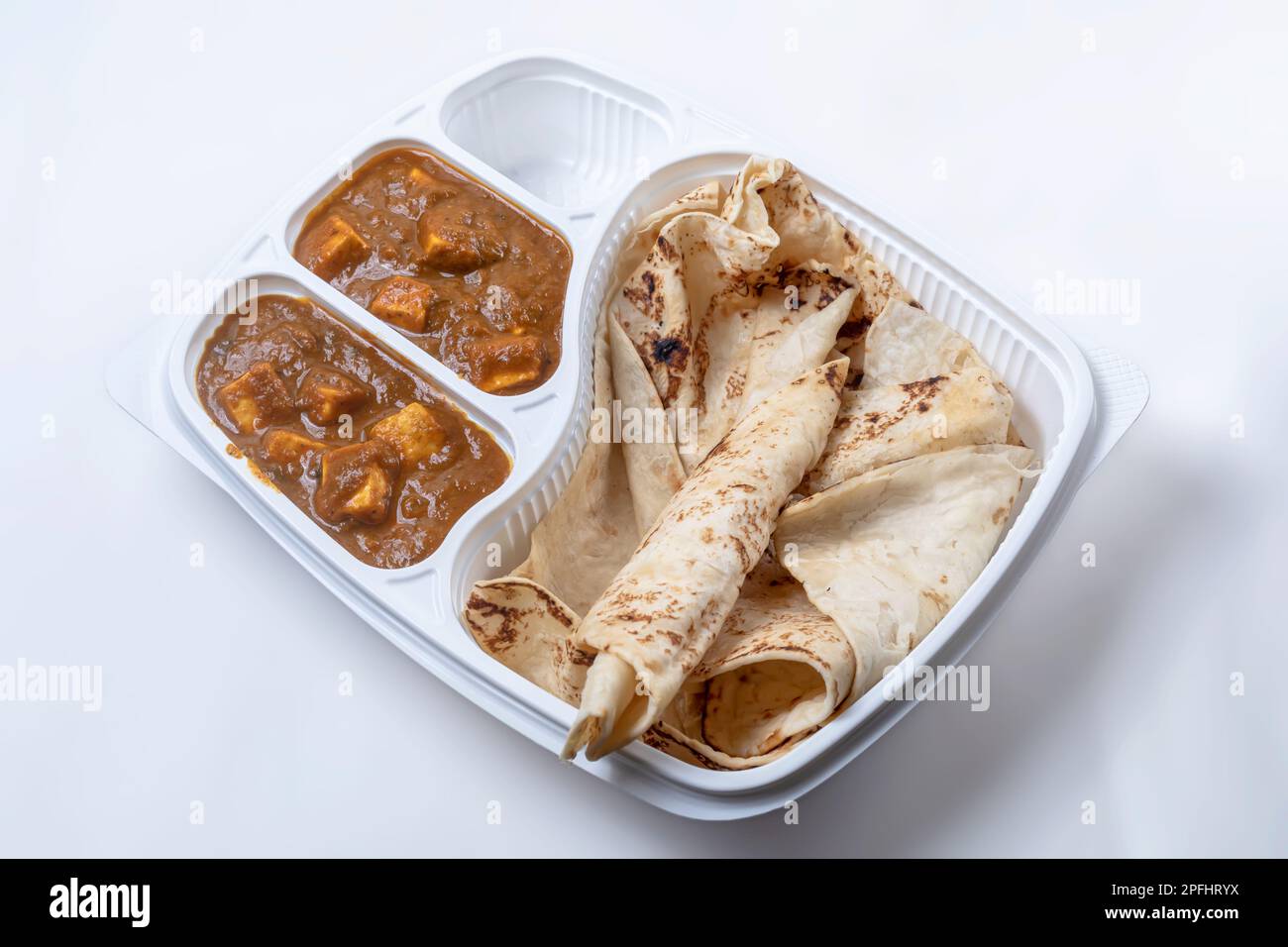 Indian food, Paneer Butter Masala Curry with Butter naan roti in a ...