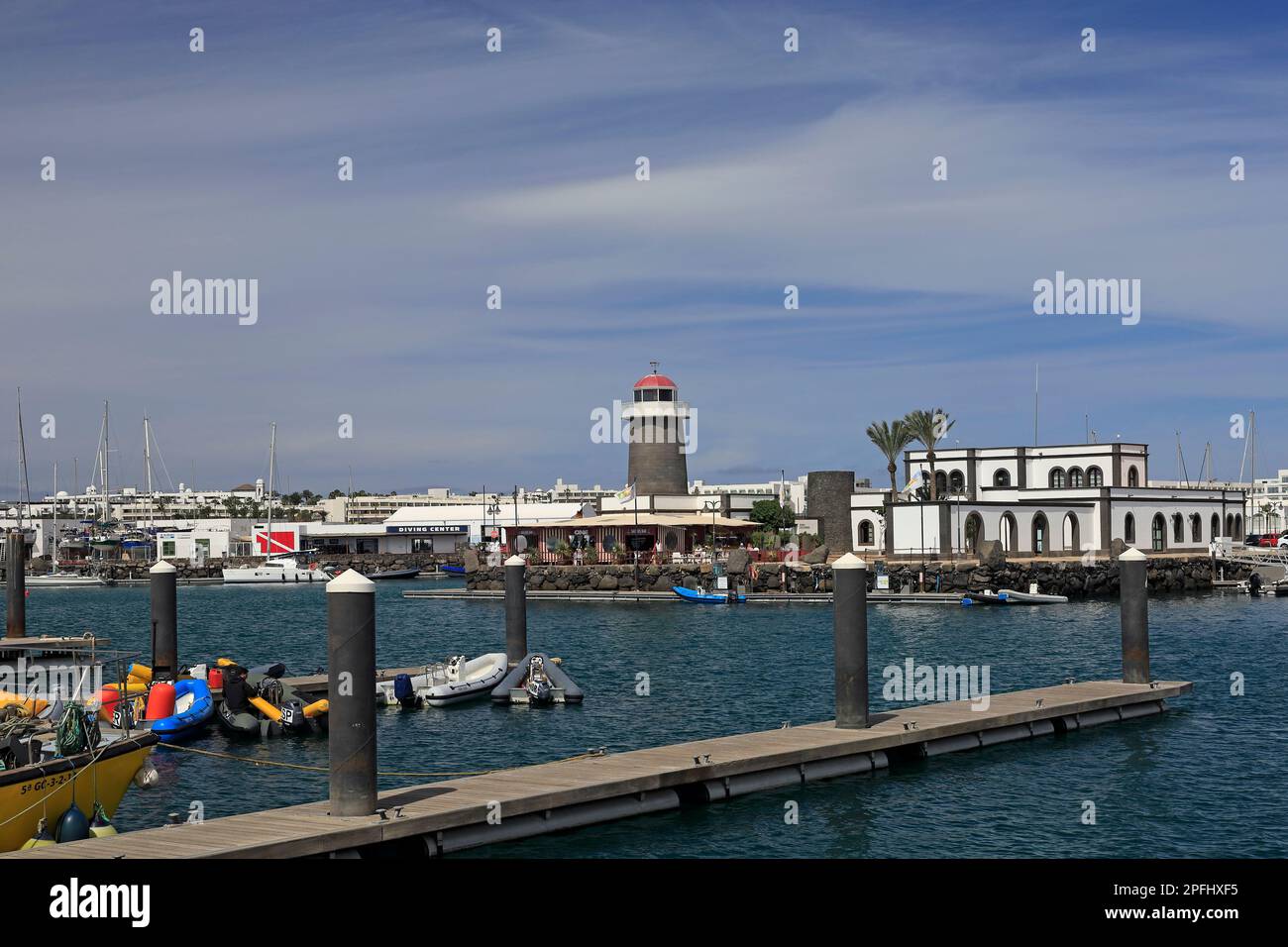 Rubicon Marina Playa Blanca with cafes and lighthouse. February 2023 ...